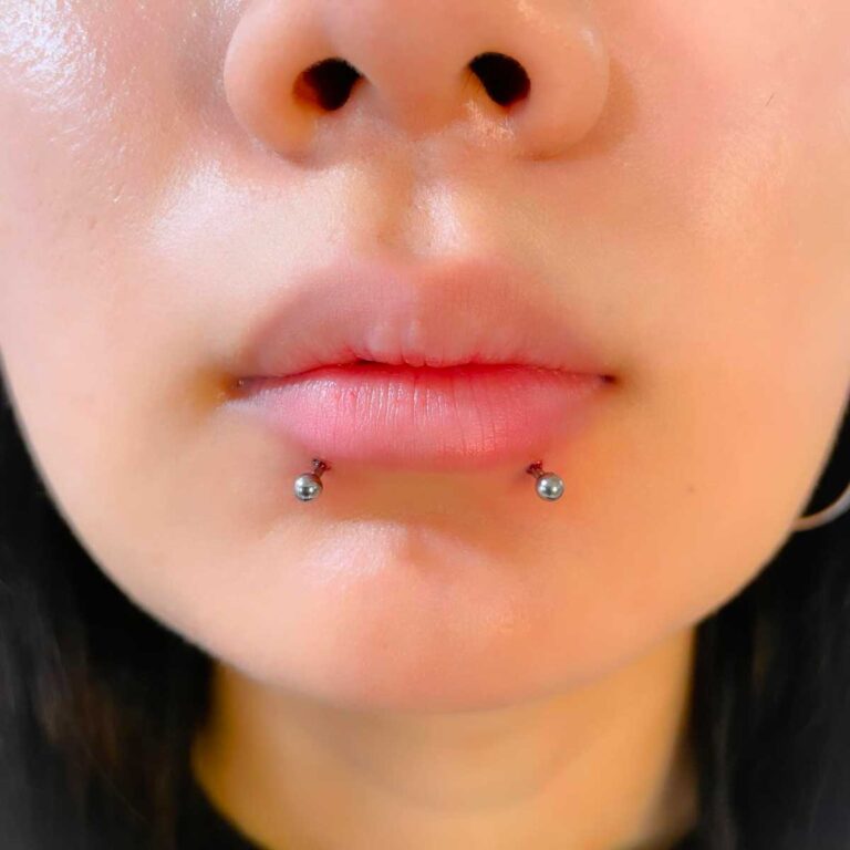 Snake Bites Piercing Guide, Pain, Cost, Healing, Aftercare